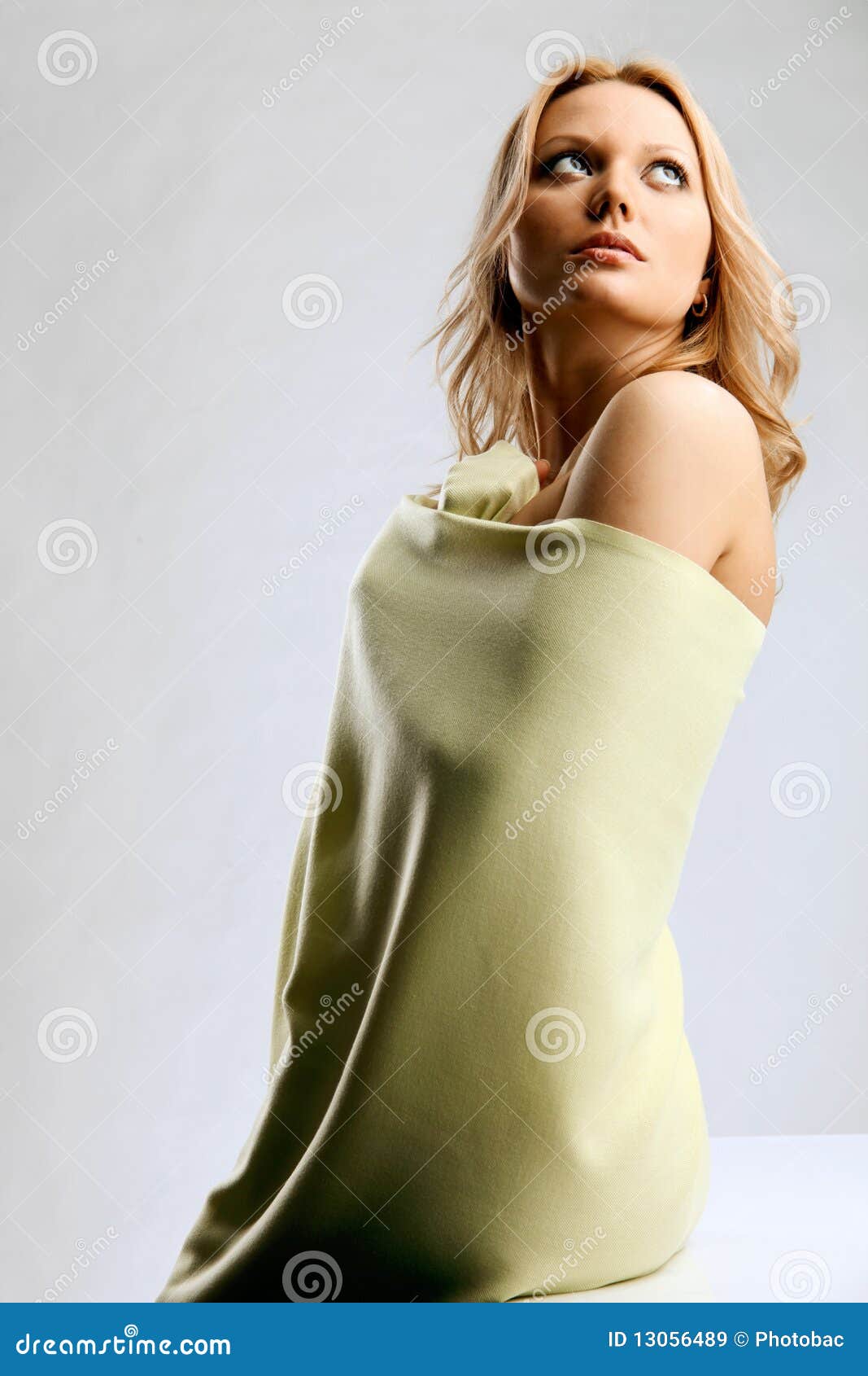 Young Blond Woman Wrapped in Light-yellow Cloth Stock Image - Image of ...