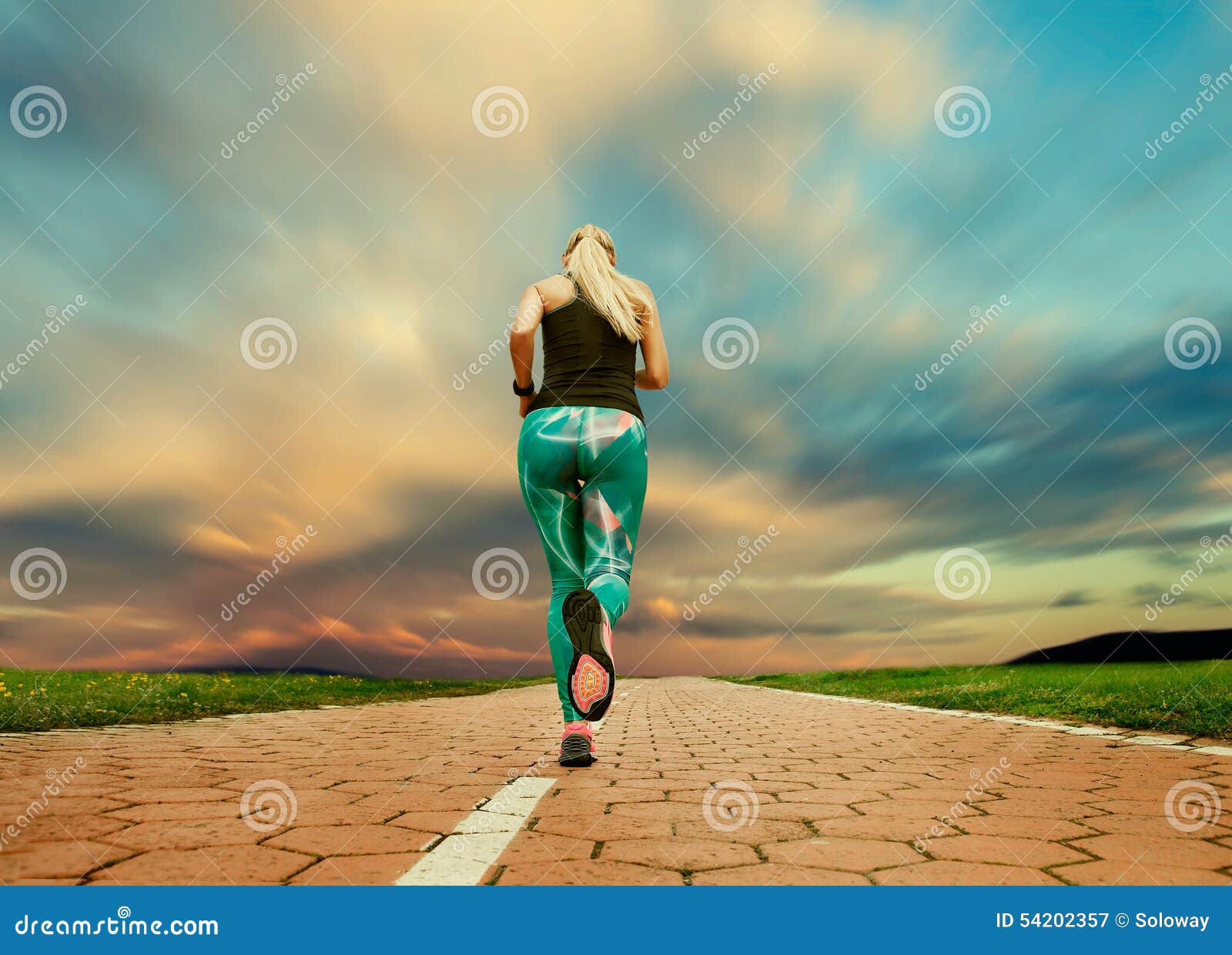 Young Blonde Girl Evening Jogging with Great Cloudscape Stock Image ...
