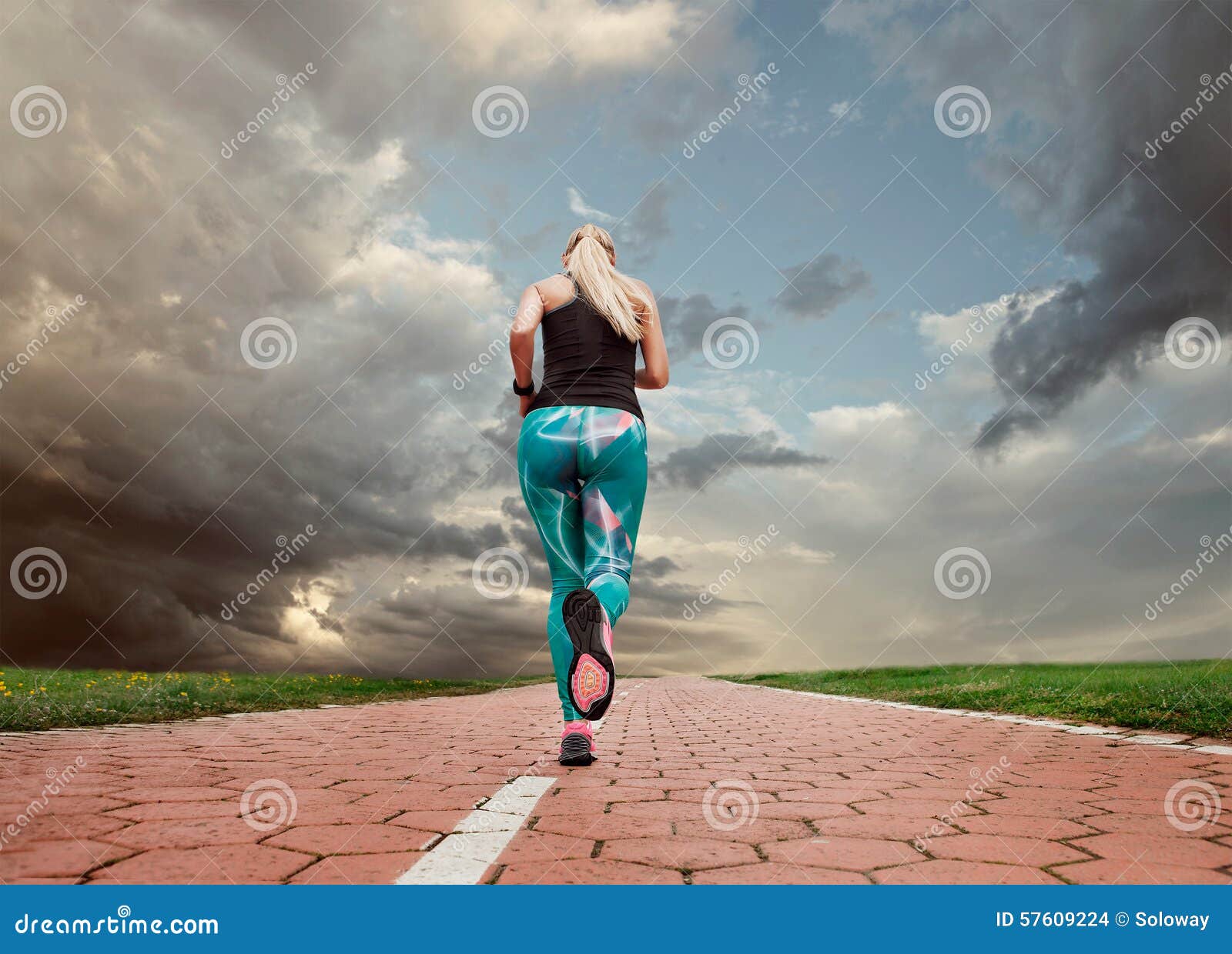 Young Blonde Girl Evening Jogging with Great Cloudscape Stock Photo ...