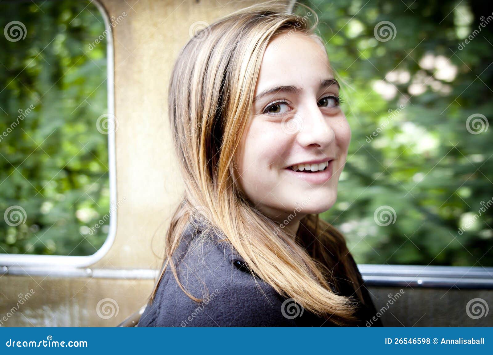 Young Blonde Girl Smiling on Train Stock Photo - Image of ...