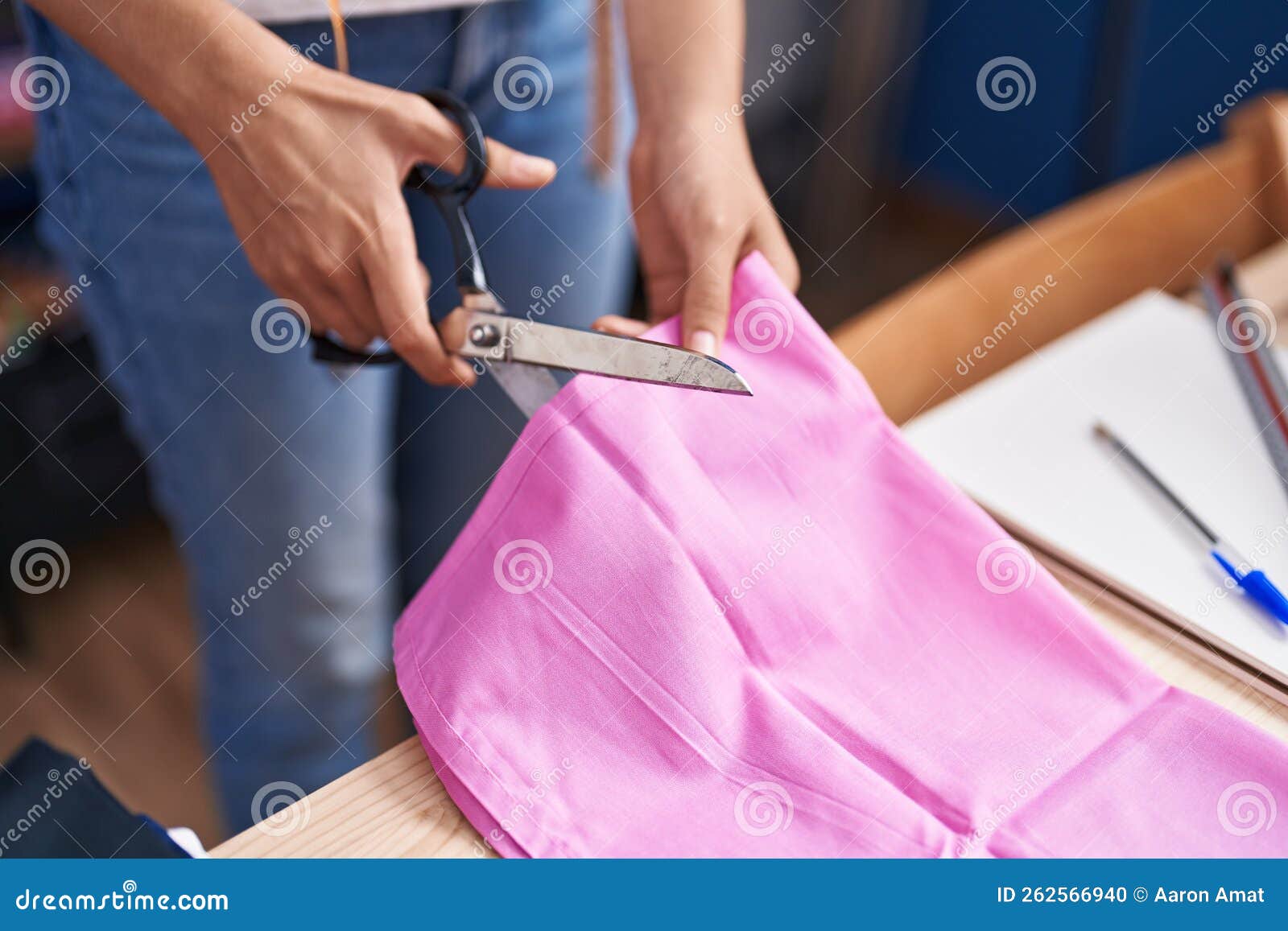 Young Blonde Girl Tailor Cutting Cloth at Sewing Studio Stock Photo ...