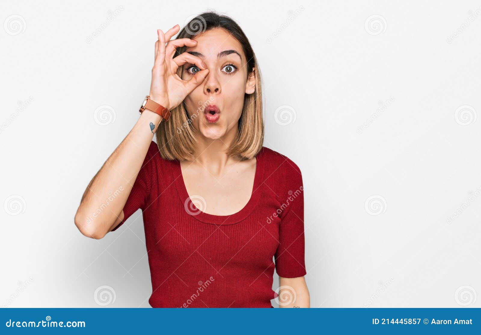 Young Blonde Girl Wearing Casual Clothes Doing Ok Gesture Shocked With