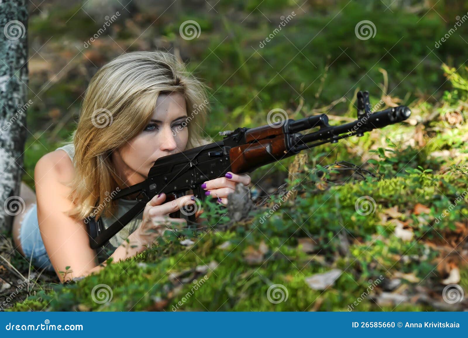 Young blonde with a rifle stock photo. Image of pretty - 26585660
