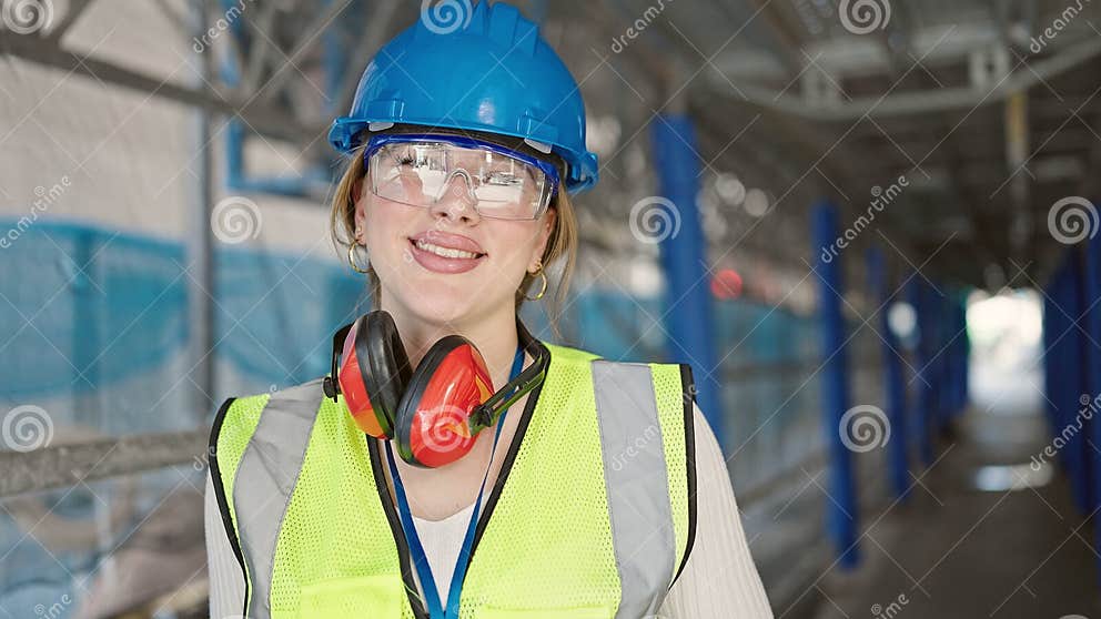 Young Blonde Woman Architect Smiling Confident Standing at Street Stock ... Young Blonde Woman Architect Smiling Confident Standing at Street Stock ...