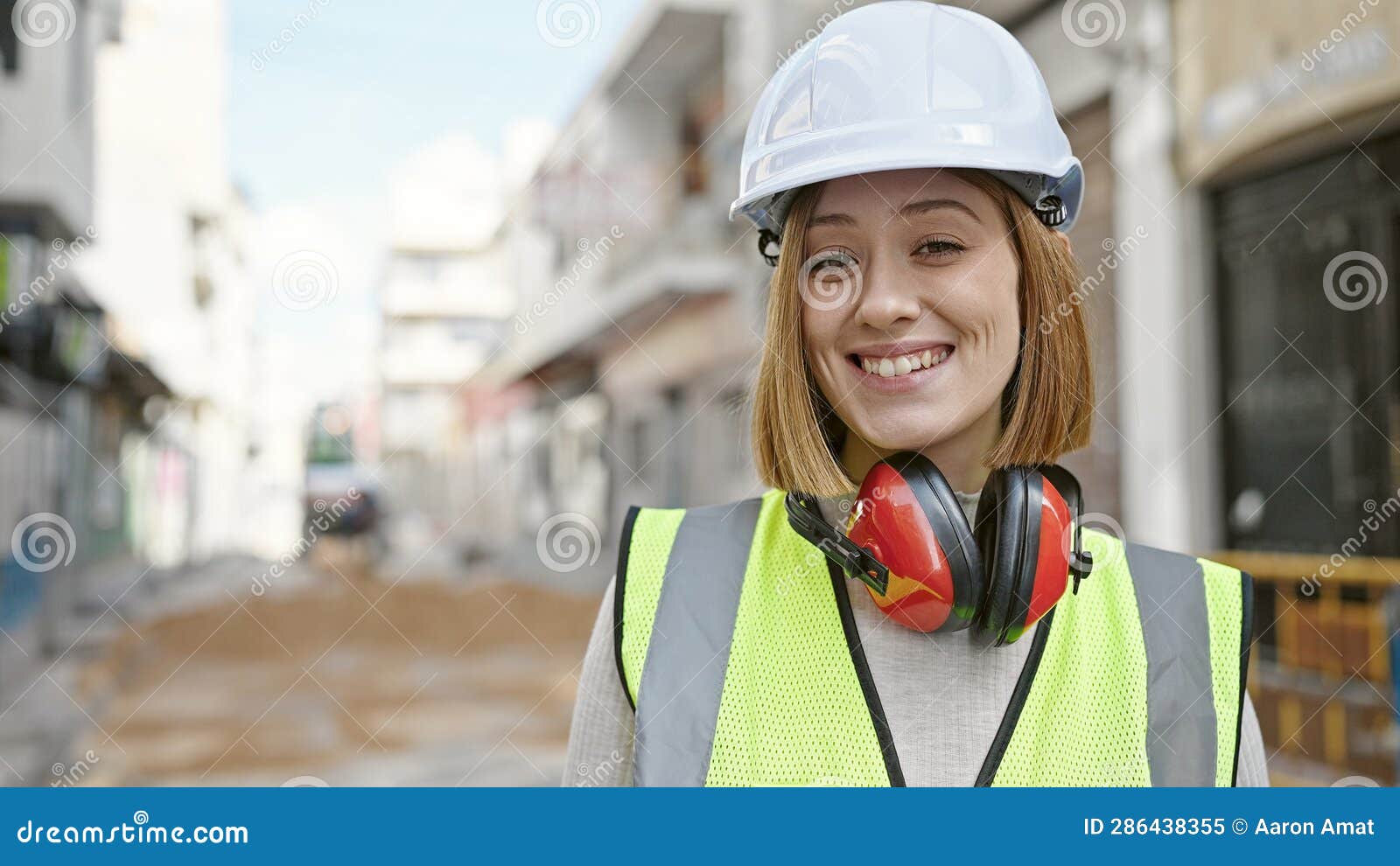 Young Blonde Woman Architect Smiling Confident Standing at Street Stock ... Young Blonde Woman Architect Smiling Confident Standing at Street Stock ...