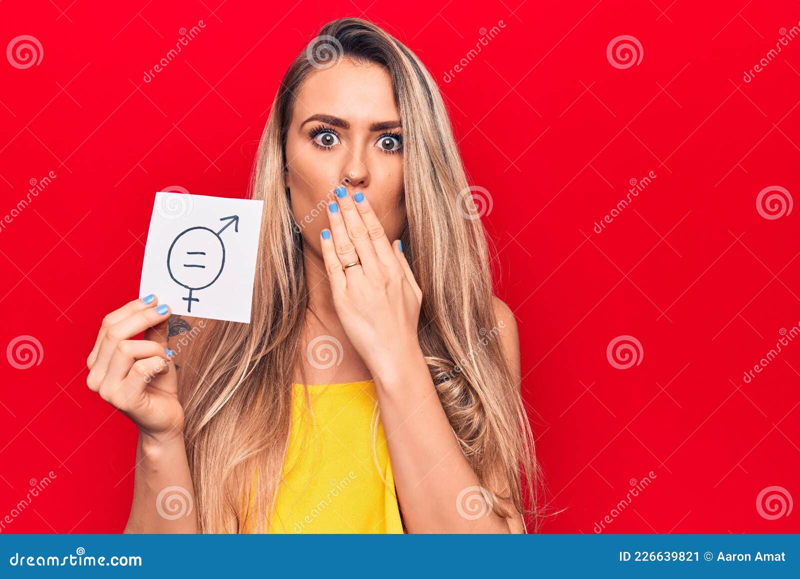 Young Blonde Woman Asking For Sex Discrimination Holding Paper With