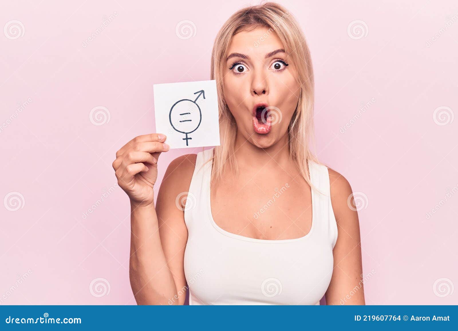 Young Blonde Woman Asking For Sex Discrimination Holding Paper With