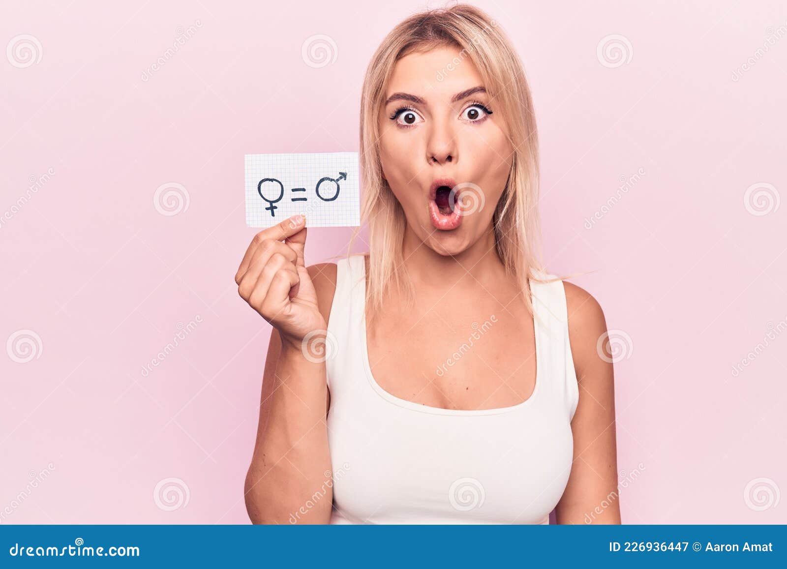Young Blonde Woman Asking For Sex Discrimination Holding Paper With