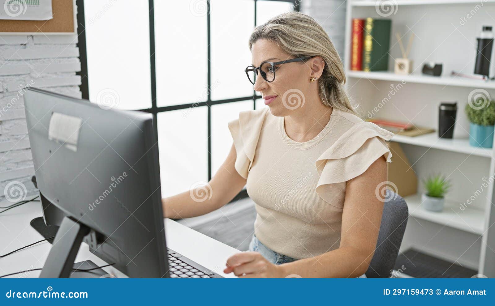 Young Blonde Woman Business Worker Using Computer Working at the Office ...