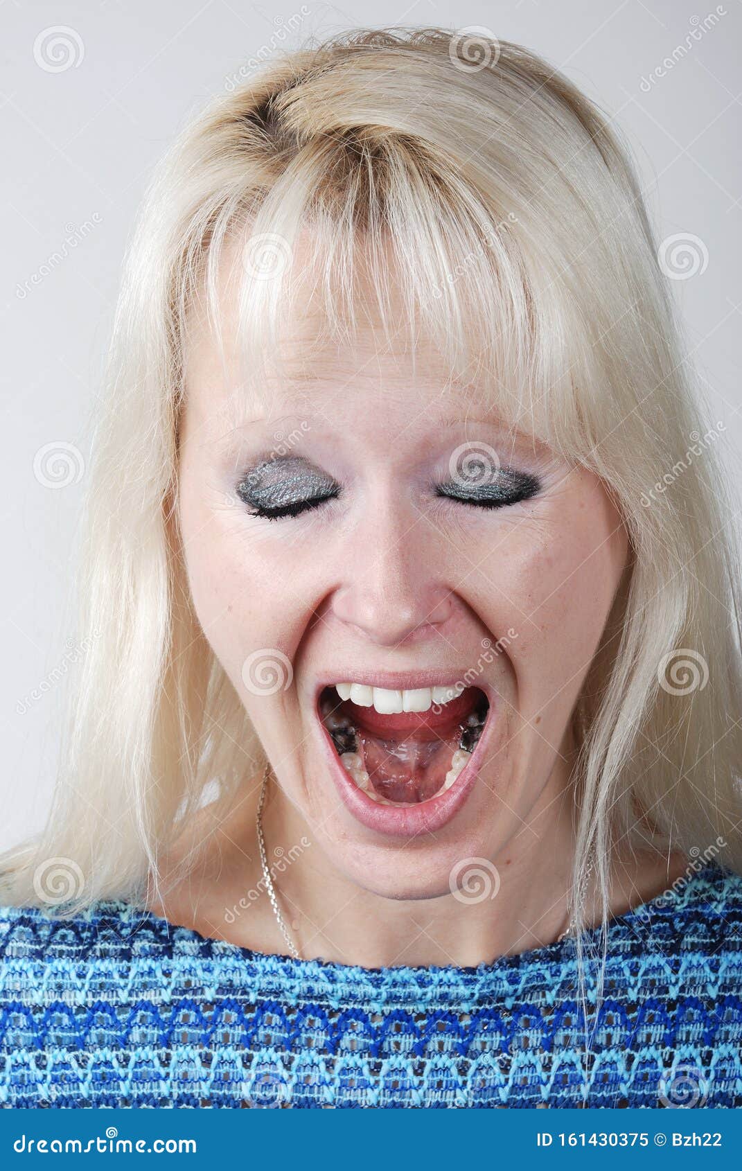 Young Blond Woman with a Cry Stock Image - Image of people, face: 161430375