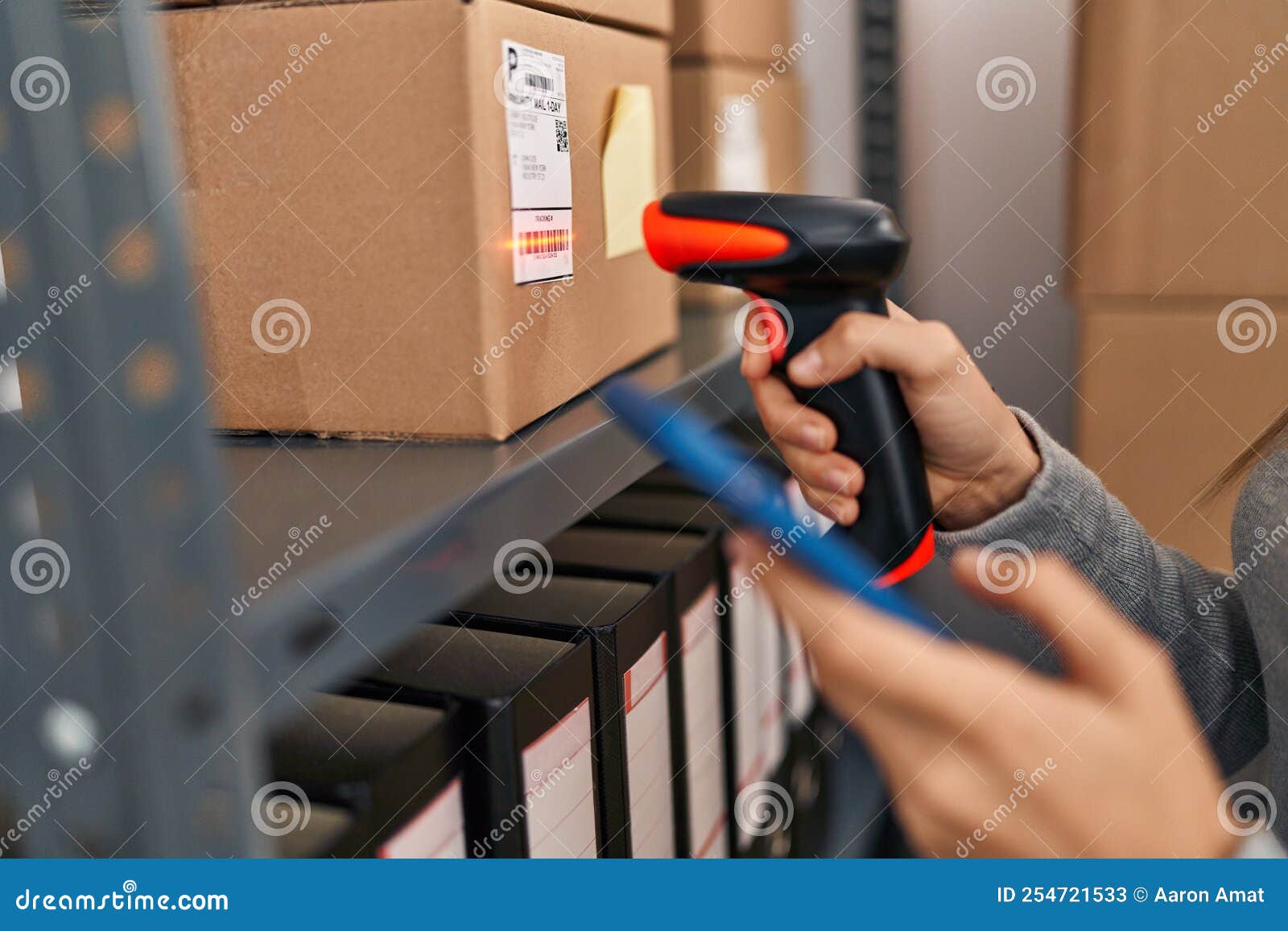 Young Blonde Woman Ecommerce Business Worker Scanning Packages Using ...