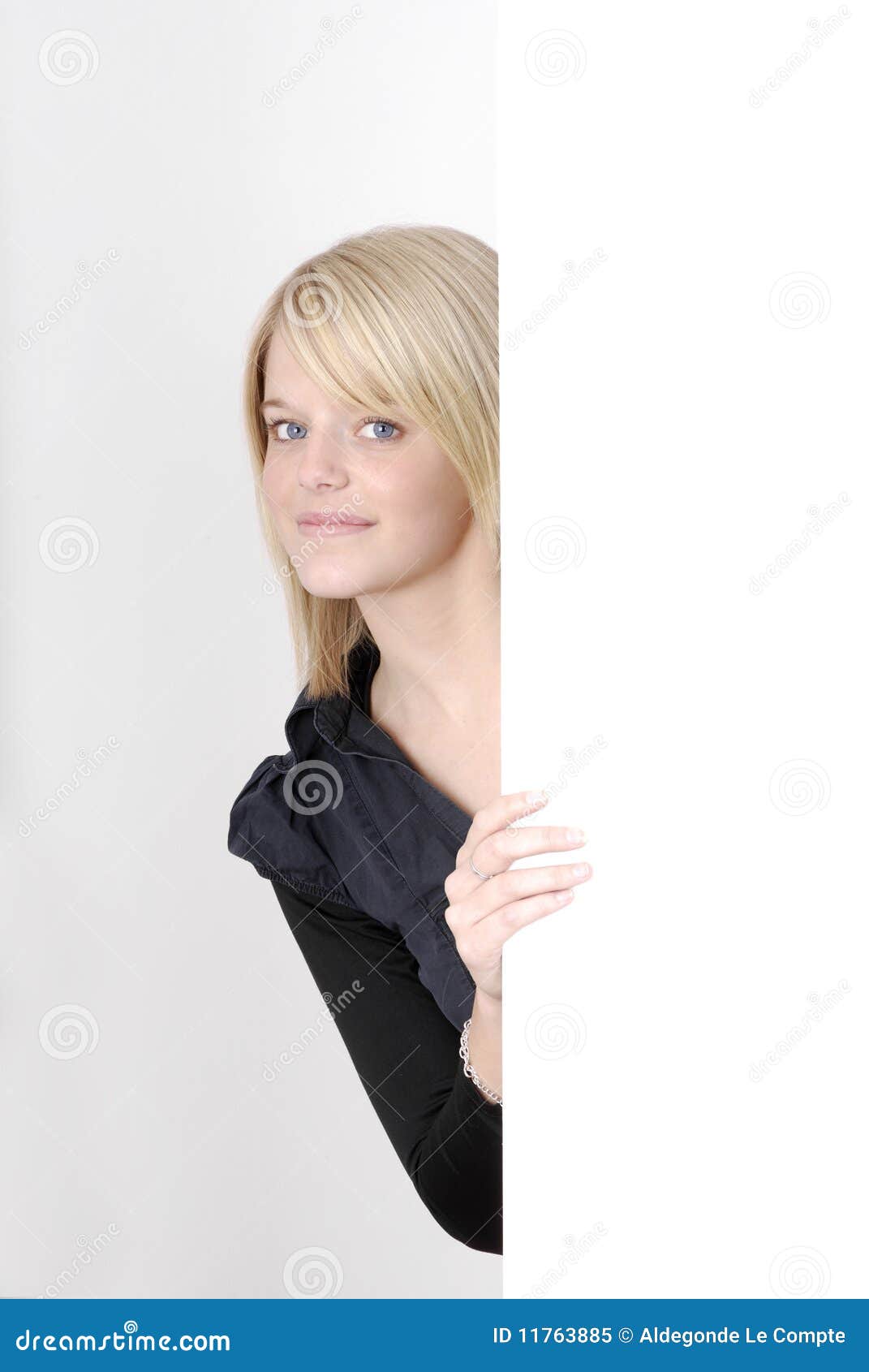 Young Blonde Woman Looking from Behind an Ad Stock Image - Image of ...