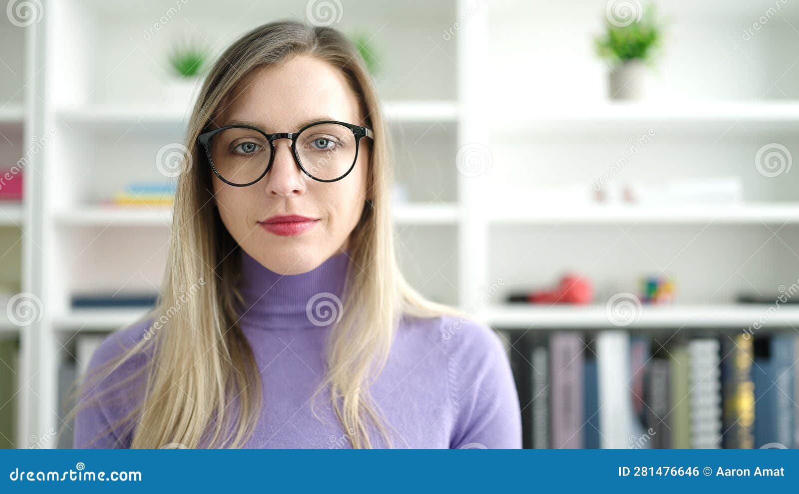Young Blonde Woman Student Standing with Relaxed Expression at Library ...