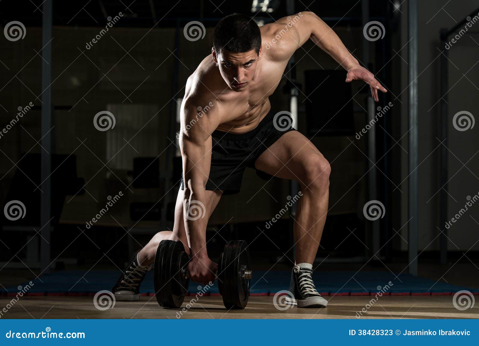Young Bodybuilder Lifting Heavy Dumbbell Stock Image - Image of indoors ...