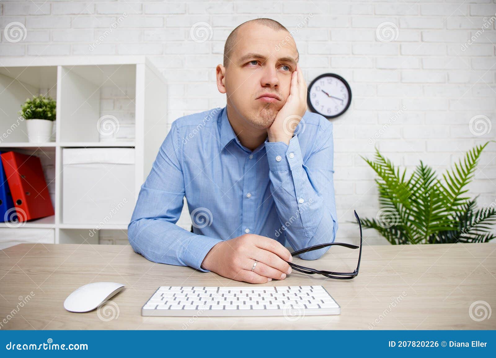 Young Bored Man Sitting in the Office Stock Photo - Image of exhausted ...
