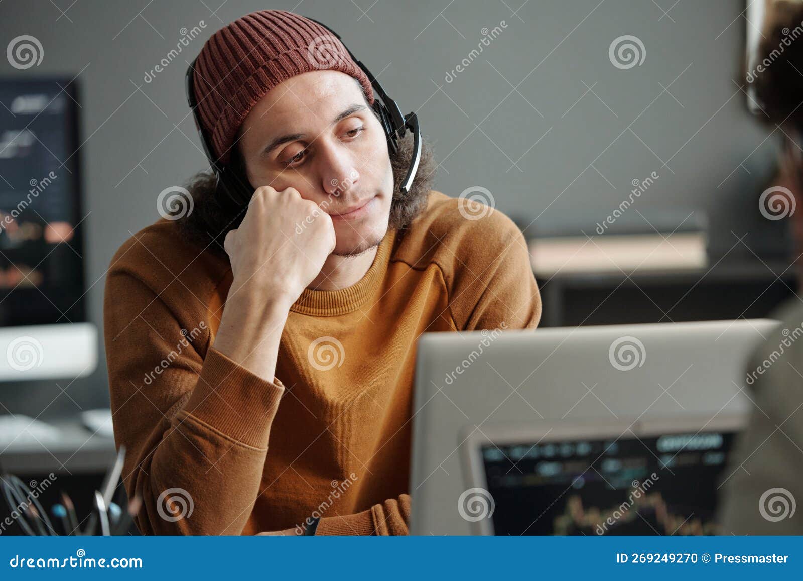 Young Bored Operator of Call Center Sitting in Front of Laptop Screen ...