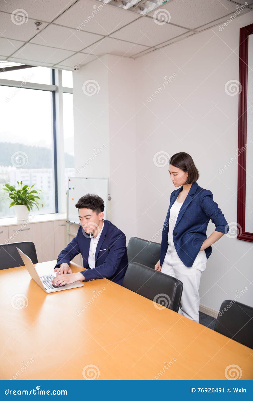 Young Boss and Assistant at Work Stock Image - Image of blackboard ...