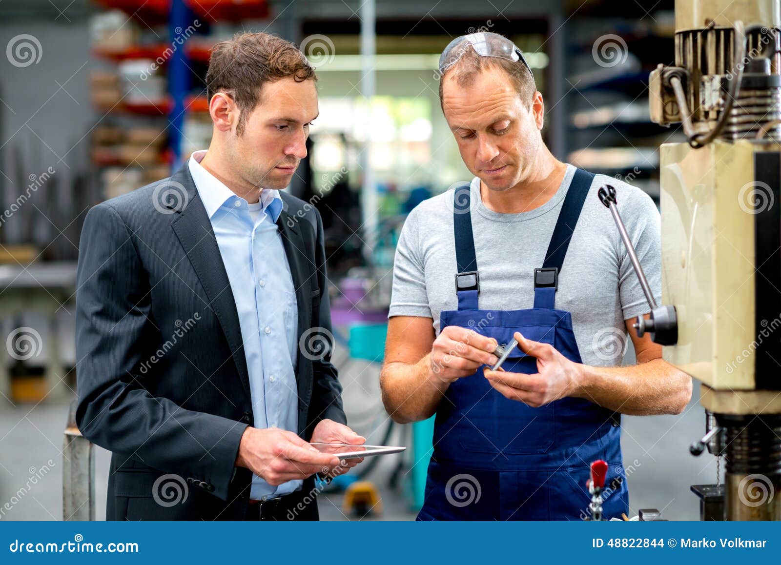 Young Boss and Worker in Conversation Stock Photo - Image of ...