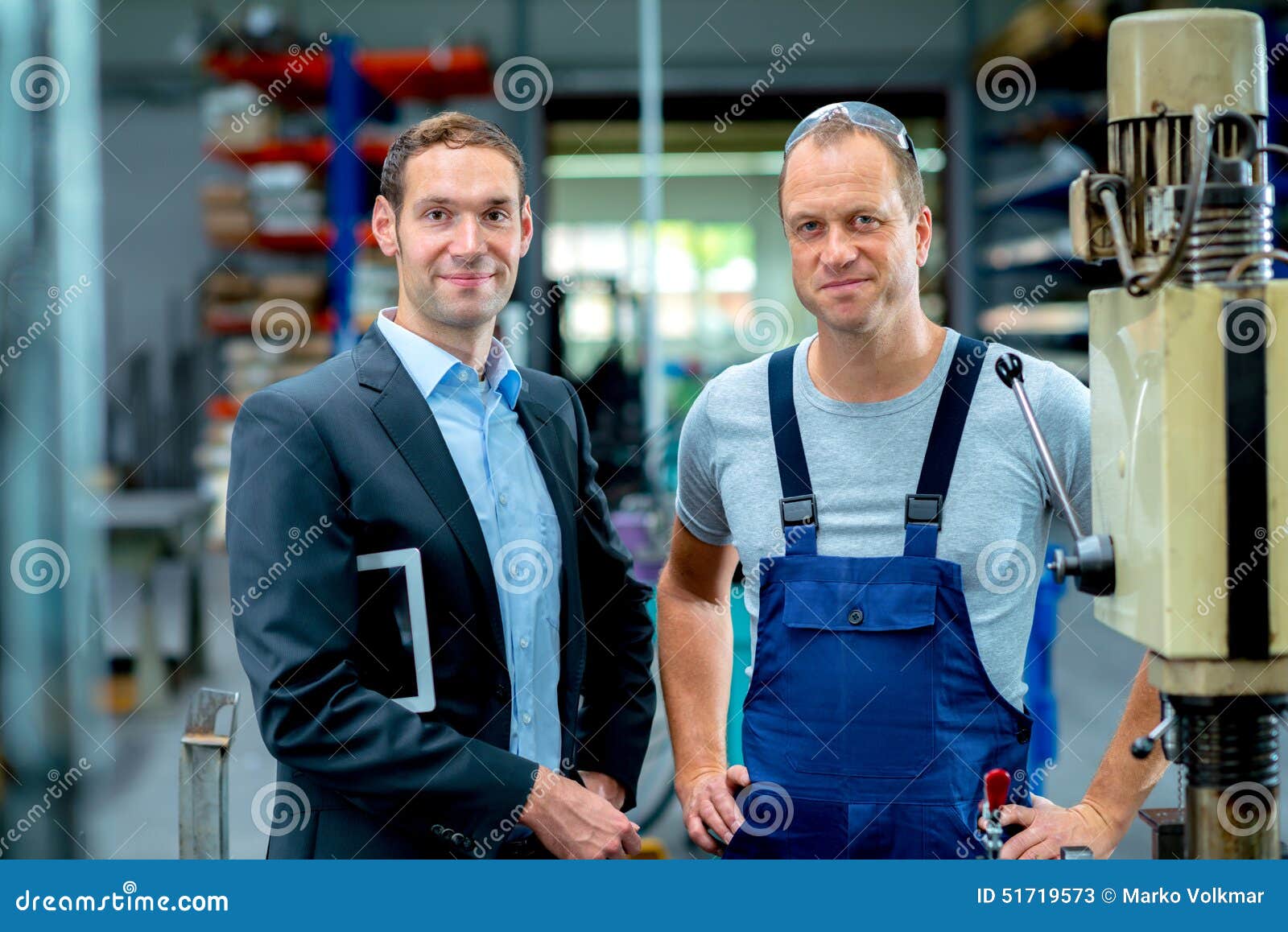 Young Boss and Worker in the Factory Stock Image - Image of caucasian ...