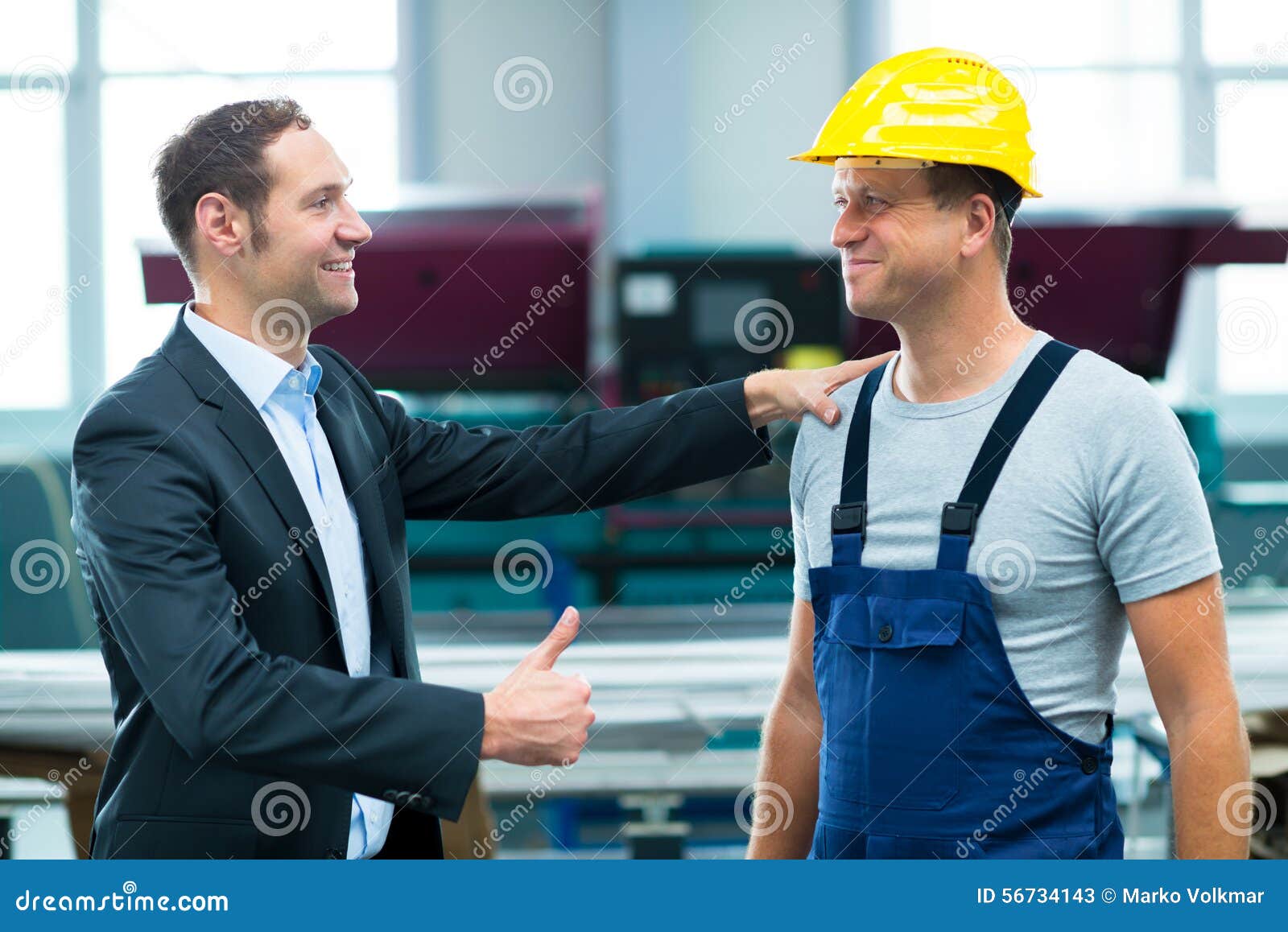 Young Boss and Worker in Factory Stock Image - Image of industry ...