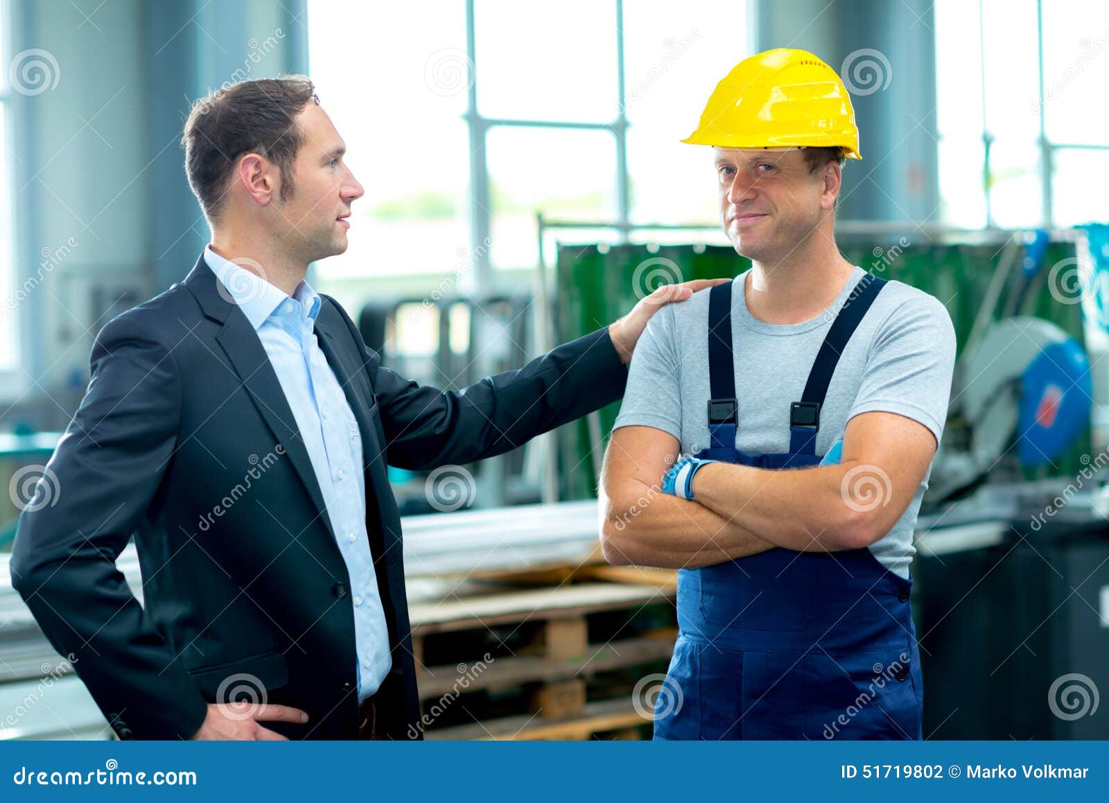 Young Boss and Worker in Factory Stock Photo - Image of foreman ...