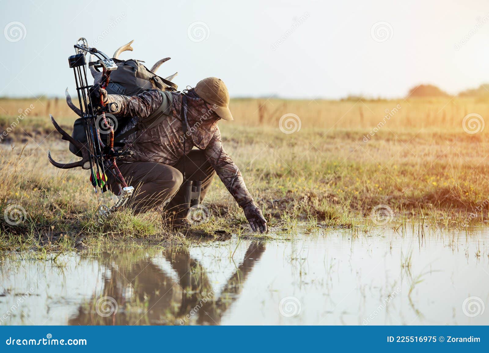 Bow Hunter Tracking Prey. Modern Bow Hunter Stock Image - Image of ...