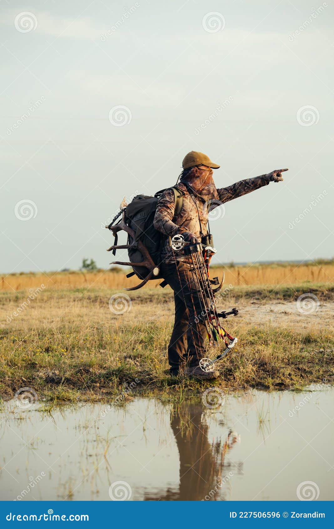 Bow Hunter Tracking Prey. Modern Bow Hunter Stock Photo - Image of draw ...