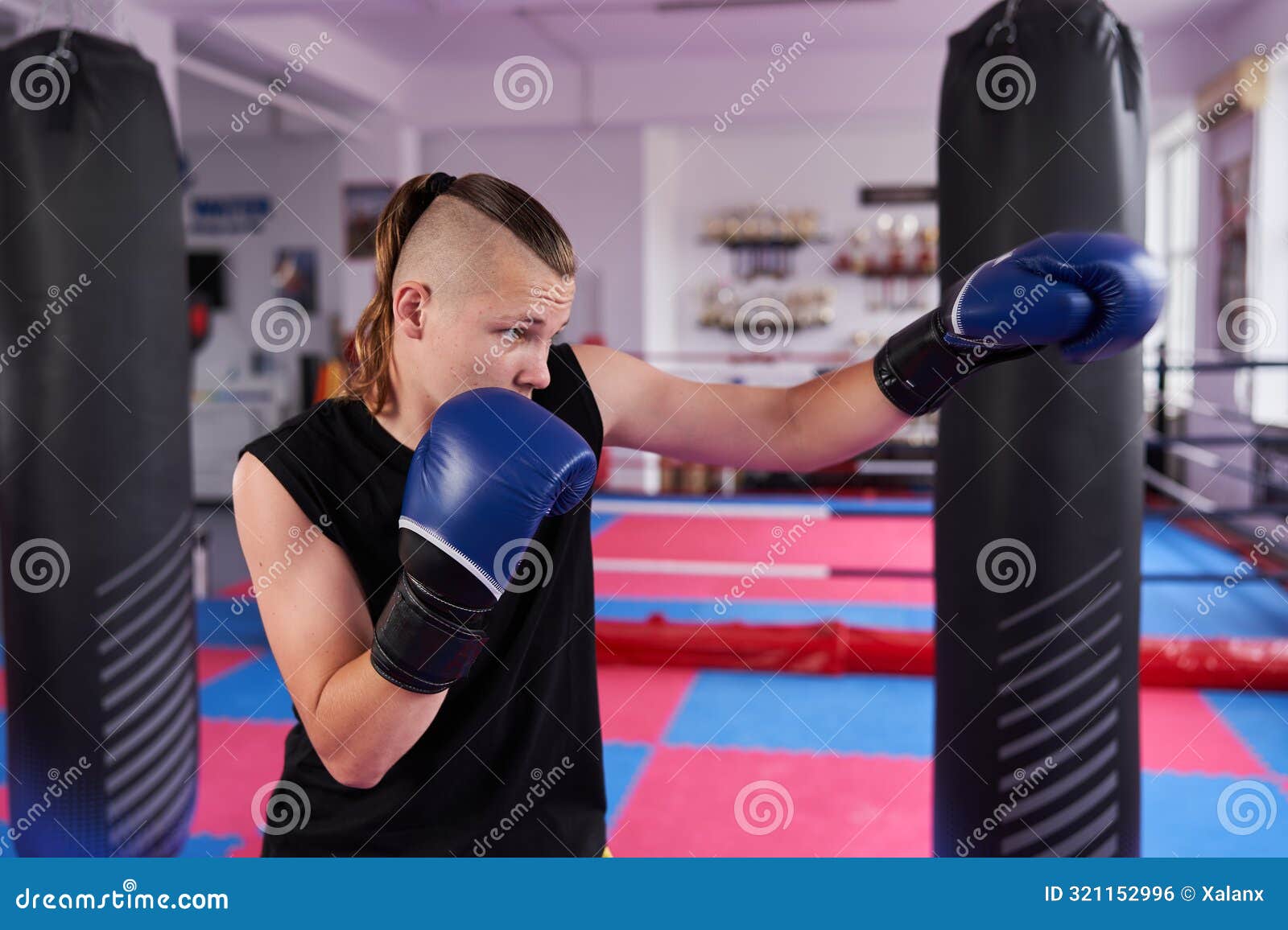 Young Boxer Doing Shadow Boxing in a Gym Stock Photo - Image of shorts ...