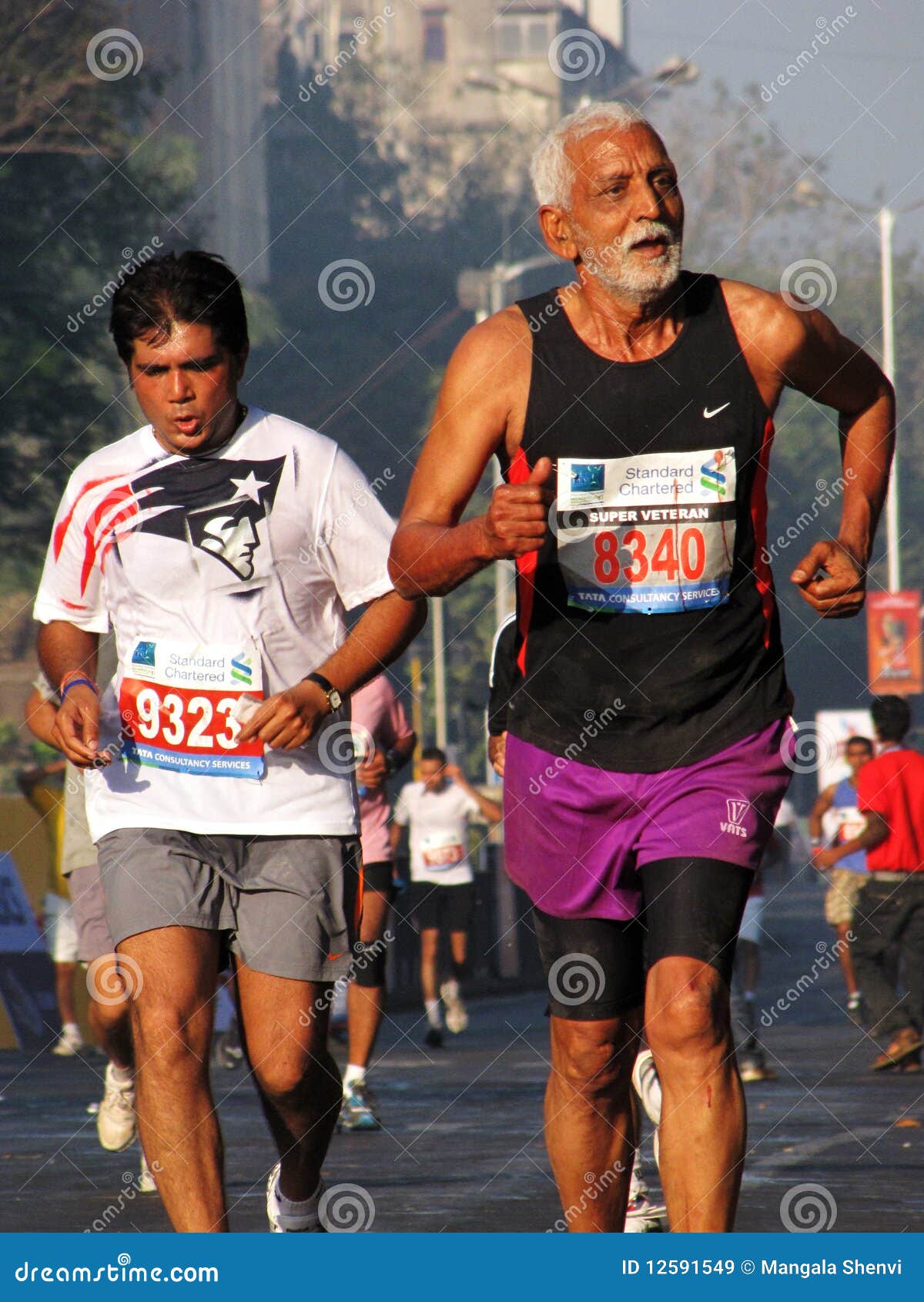 Young Boy and an Aged Man Running in Marathon Editorial Stock Image ...