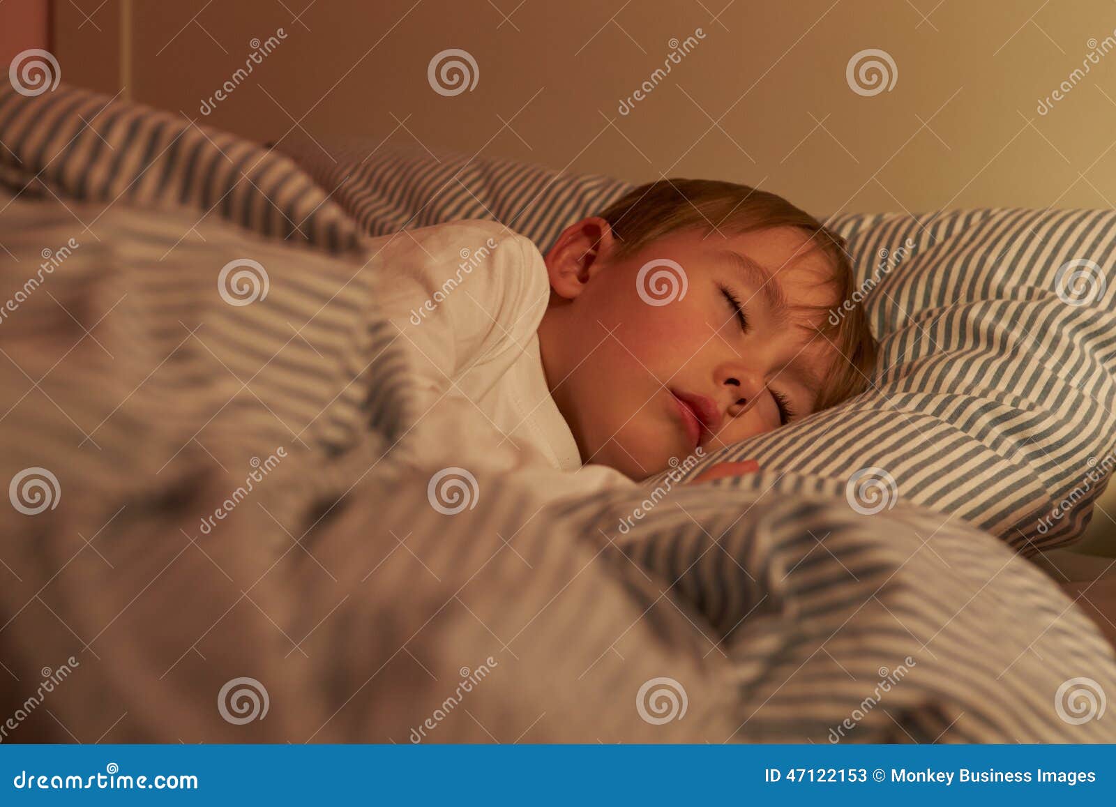 Young Boy Asleep in Bed at Night Stock Image - Image of male, years ...