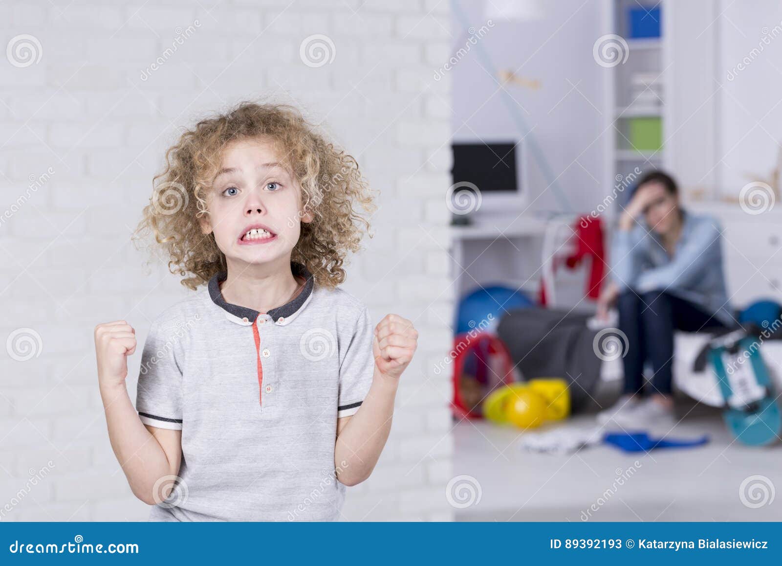 An Overactive Child Screaming And Hitting A Floor While A ...