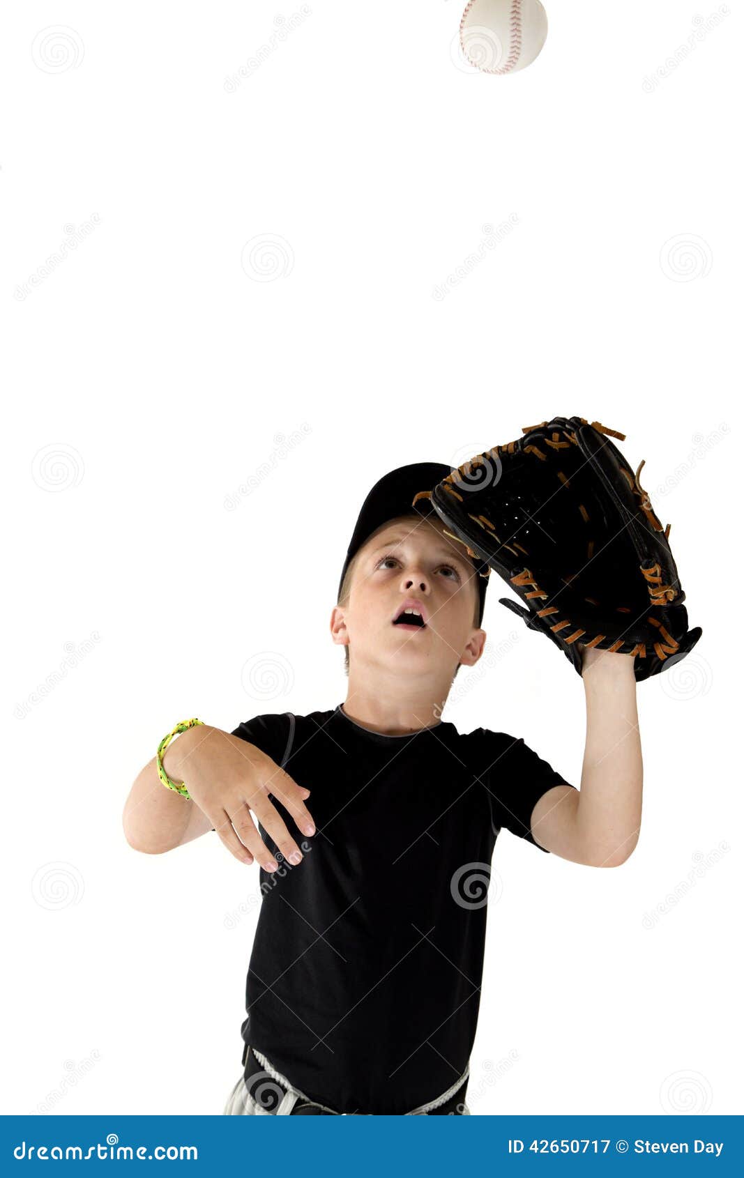 Young Boy Baseball Player Focused on Catching the Baseball Stock Image ...