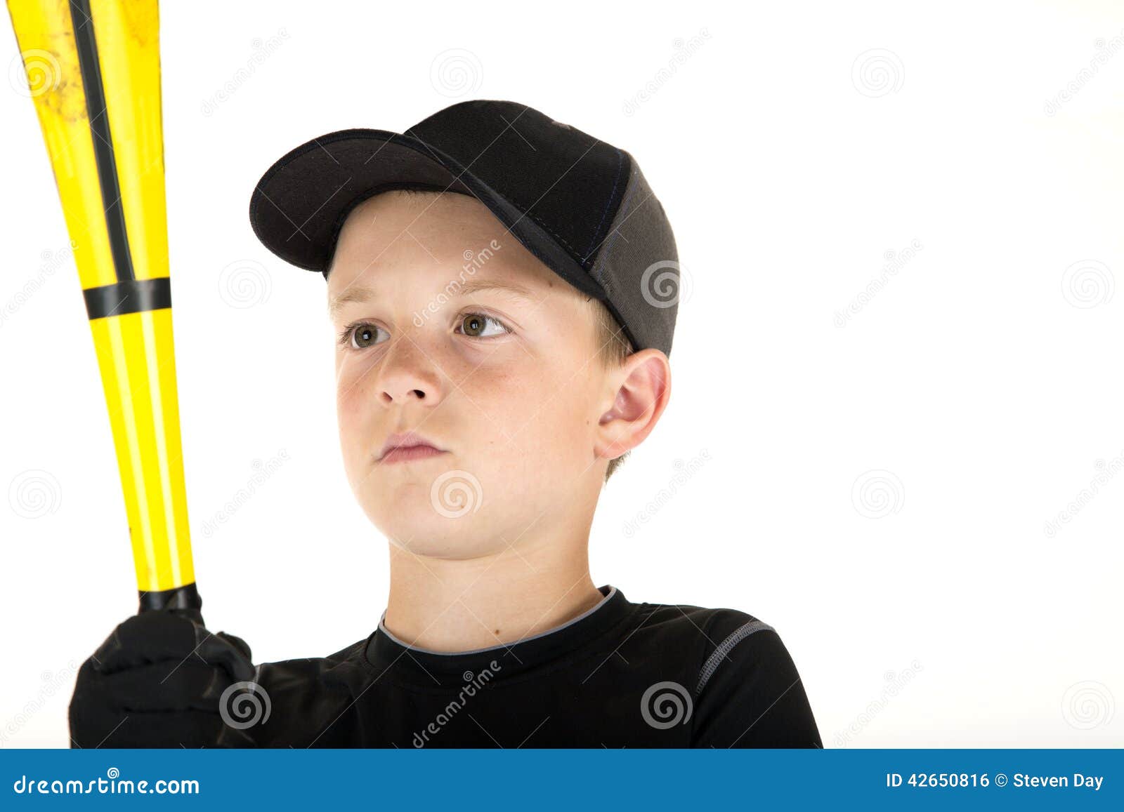 Young Boy Baseball Player Looking at His Bat Stock Photo - Image of ...