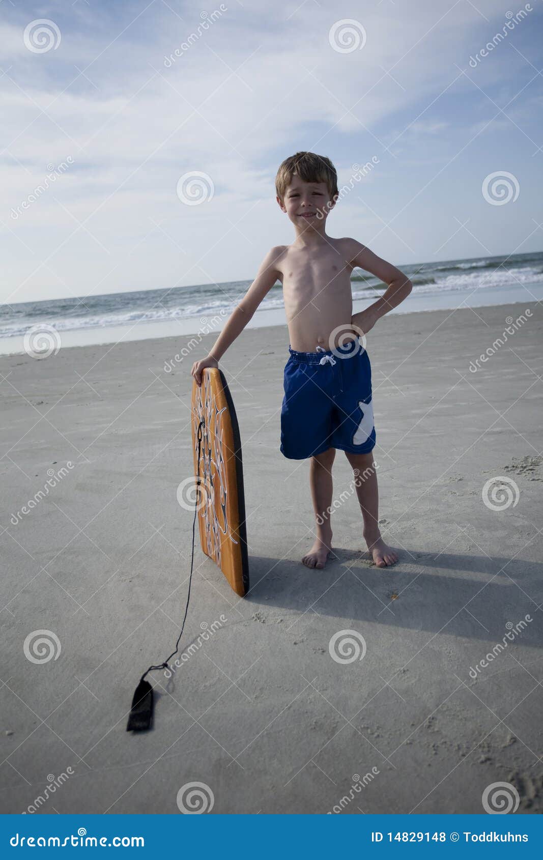 Young Boy at the Beach stock photo. Image of shore, coast - 14829148