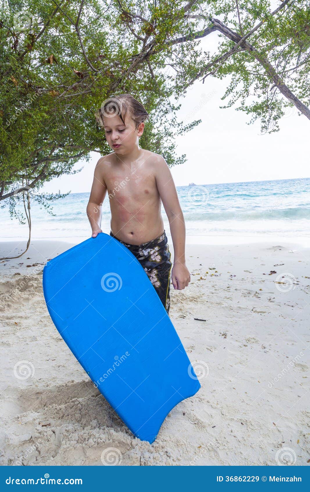 Young Boy at the Beach is Exhausted Stock Image - Image of enjoying ...
