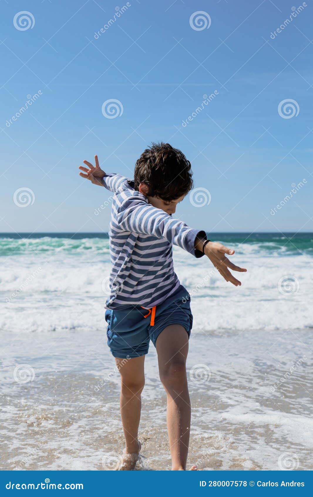 Young Boy on the Beach, by the Sea, Vertical Image Stock Photo - Image ...