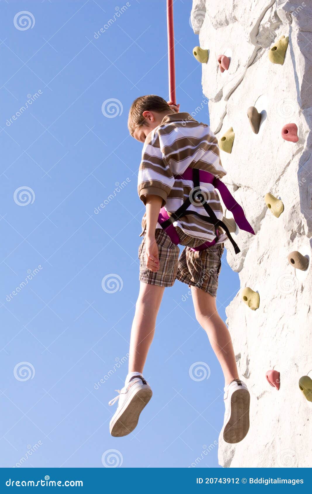Young Boy Being Lowered stock photo. Image of climb, rock - 20743912