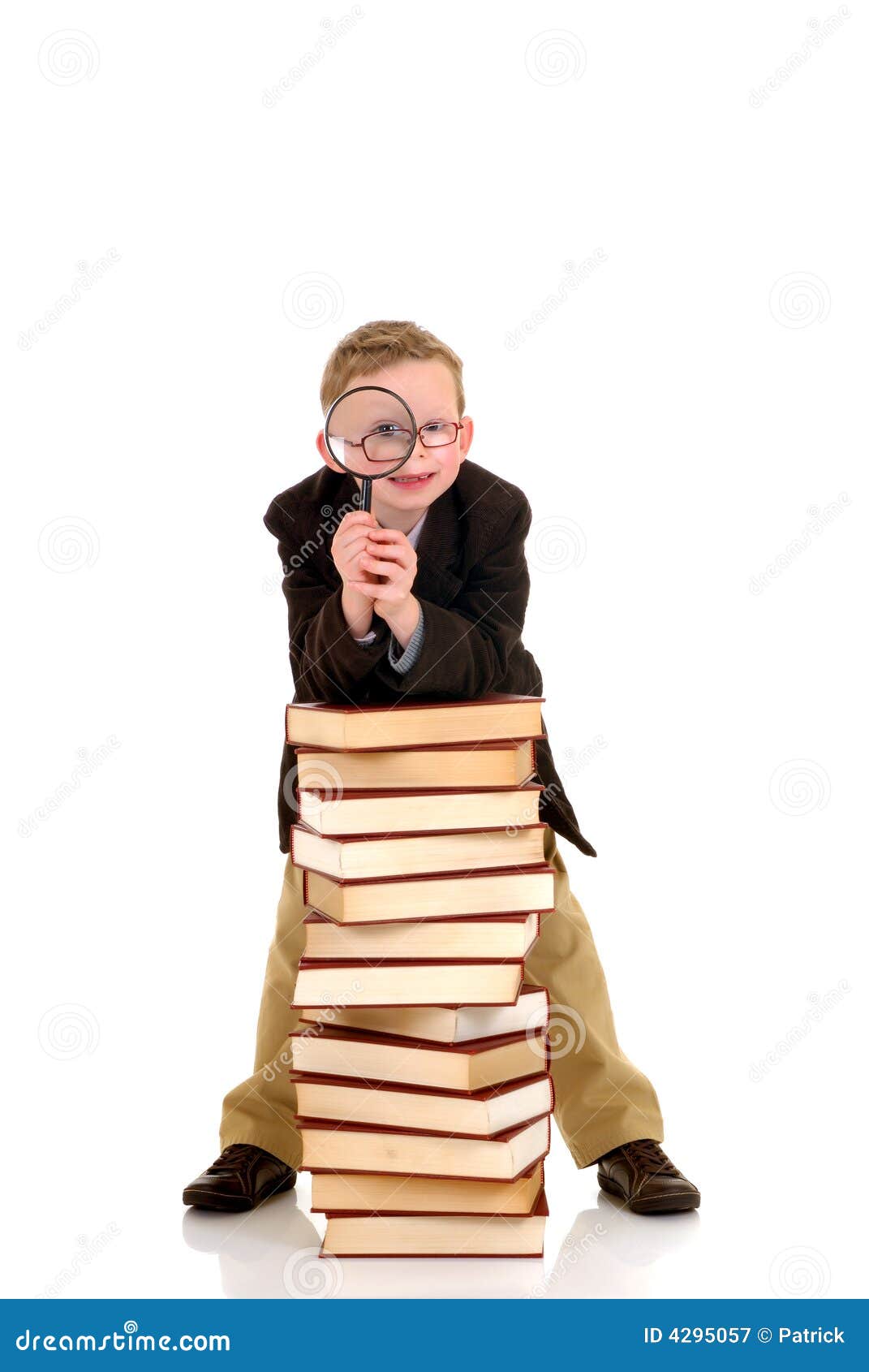 Young boy on books stock image. Image of studio, handsome - 4295057