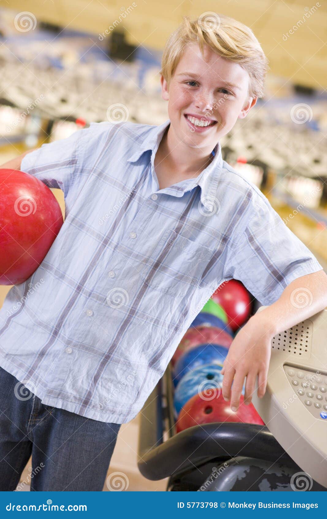 Young Boy in Bowling Alley Holding Ball Stock Photo - Image of bowling ...