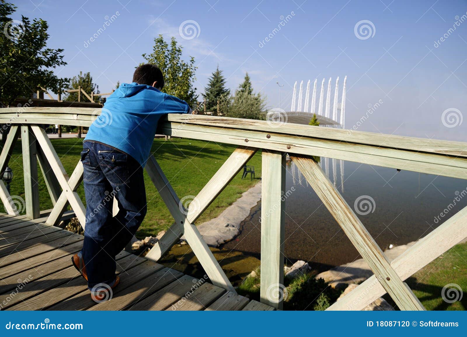 Young boy on the bridge stock photo. Image of pedestrian - 18087120