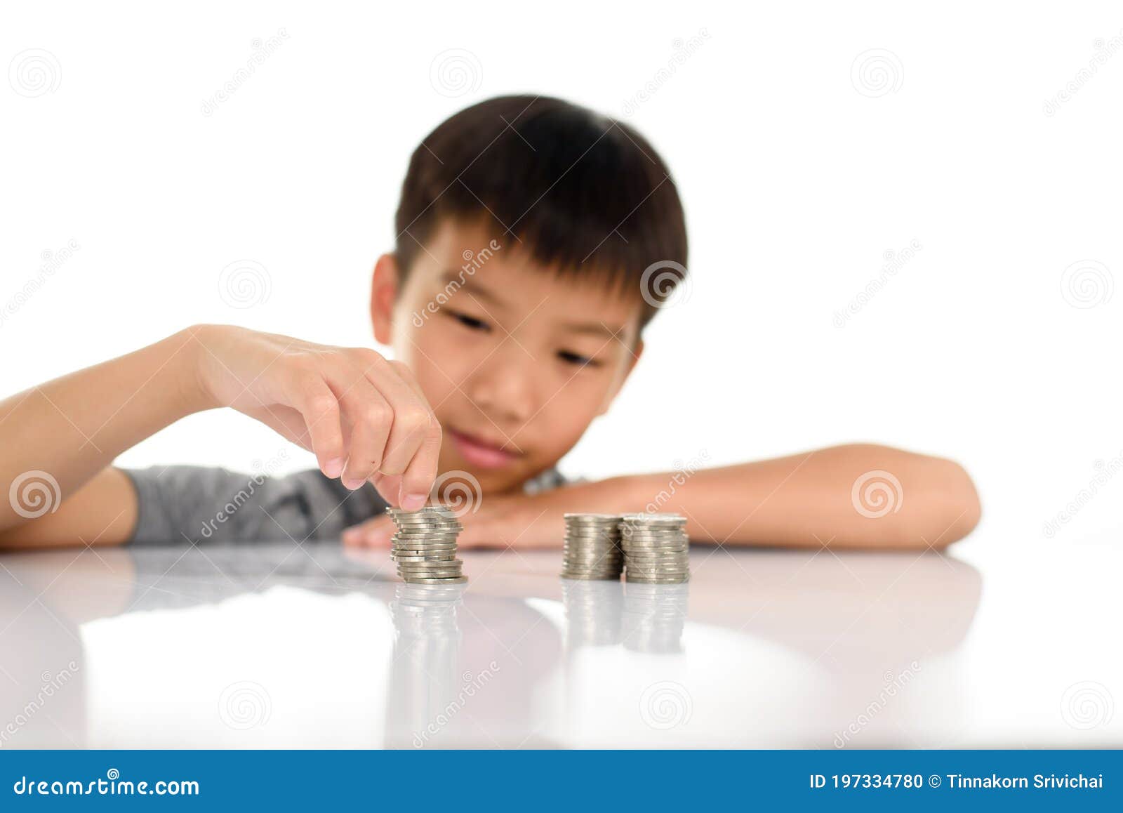Young Boy Build a Coin Tower Stock Photo - Image of coin, currency ...