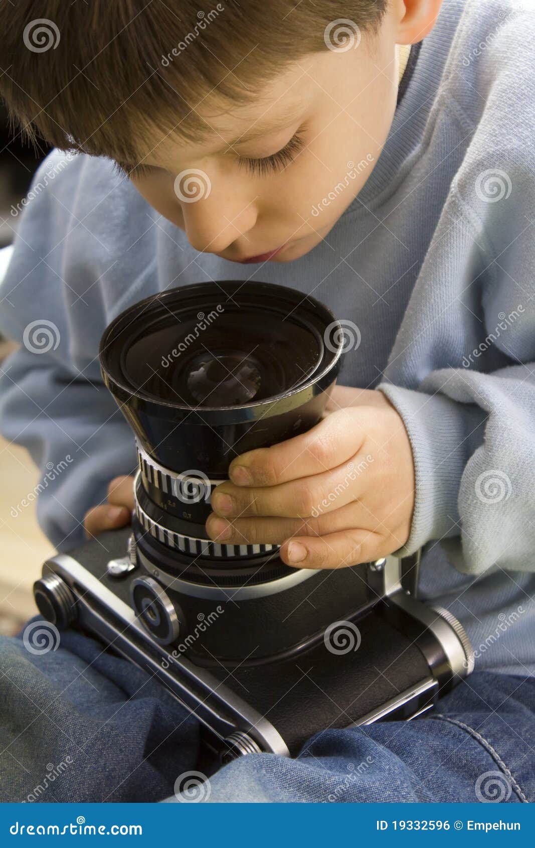 Young boy with camera stock photo. Image of single, medium - 19332596
