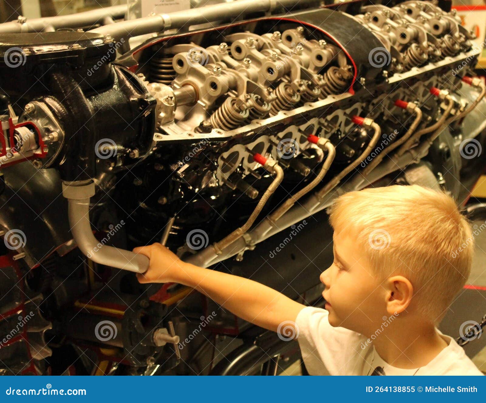 Young Boy Checks Out a Jet Engine Stock Image - Image of checks, young ...