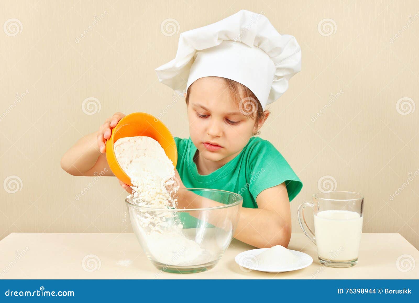 Young Boy in Chefs Hat Pours Flour for Baking Cake Stock Photo - Image ...