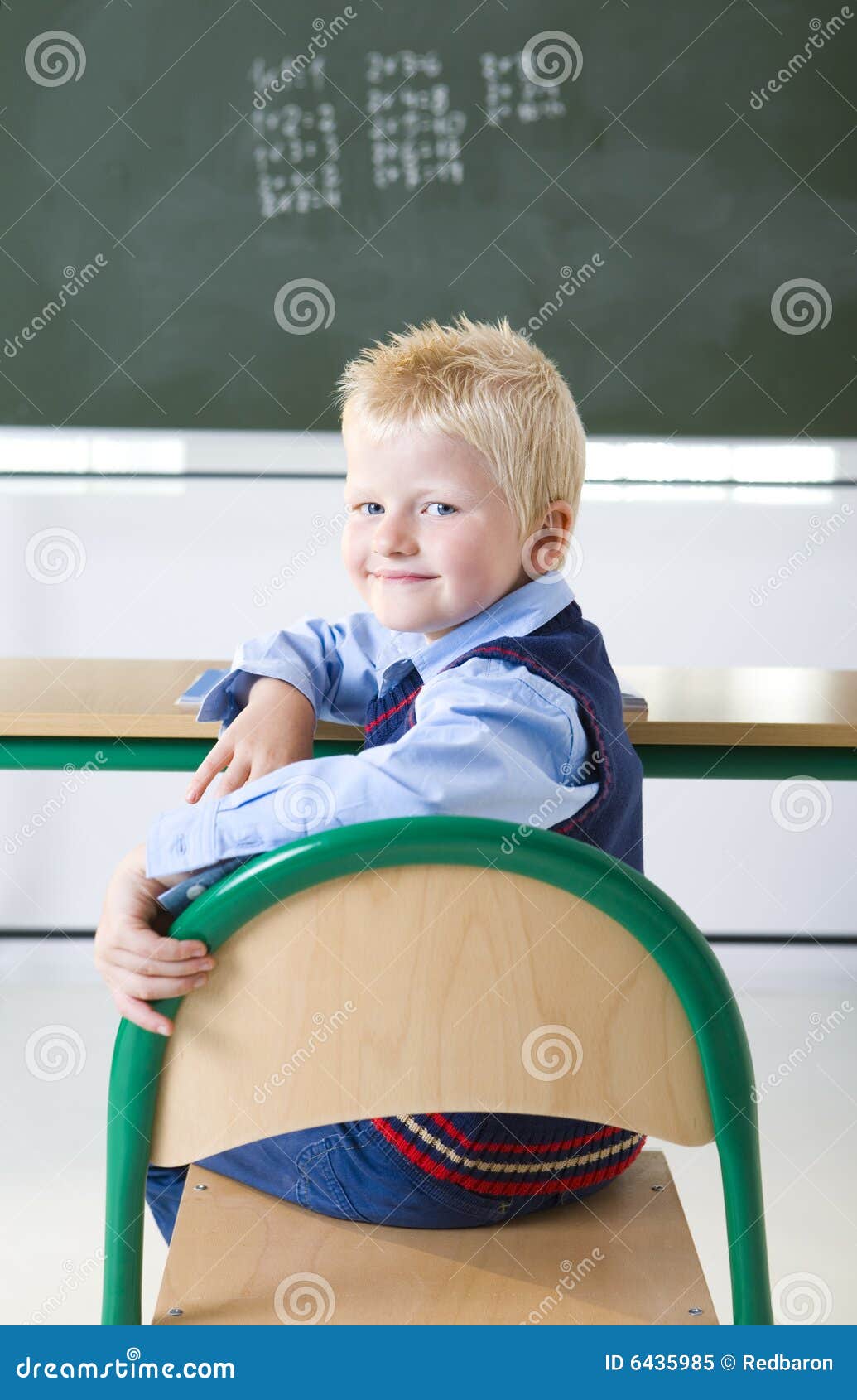 Young boy in the classroom stock image. Image of schooltime - 6435985