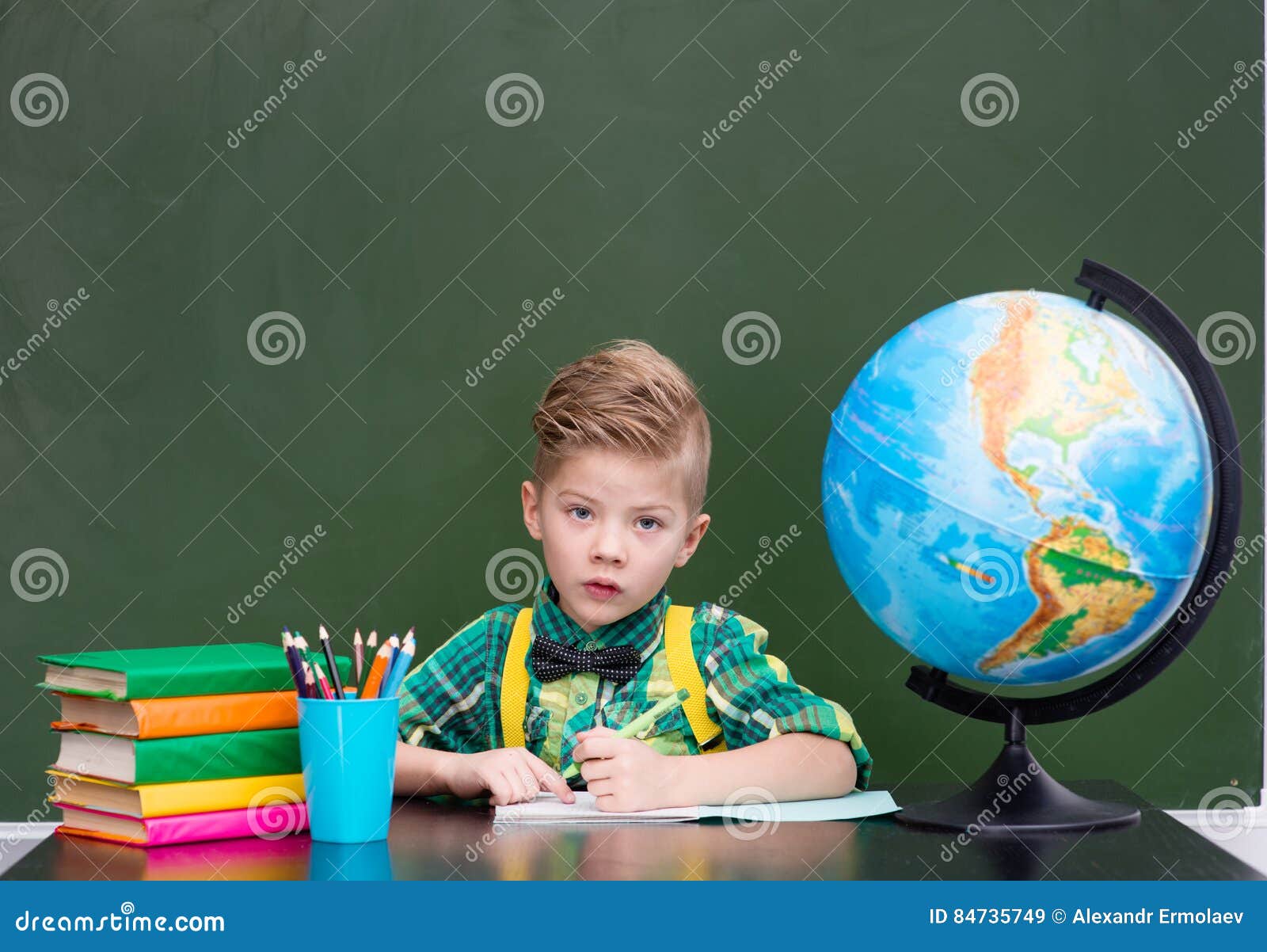 Young boy in classroom stock image. Image of desk, little - 84735749