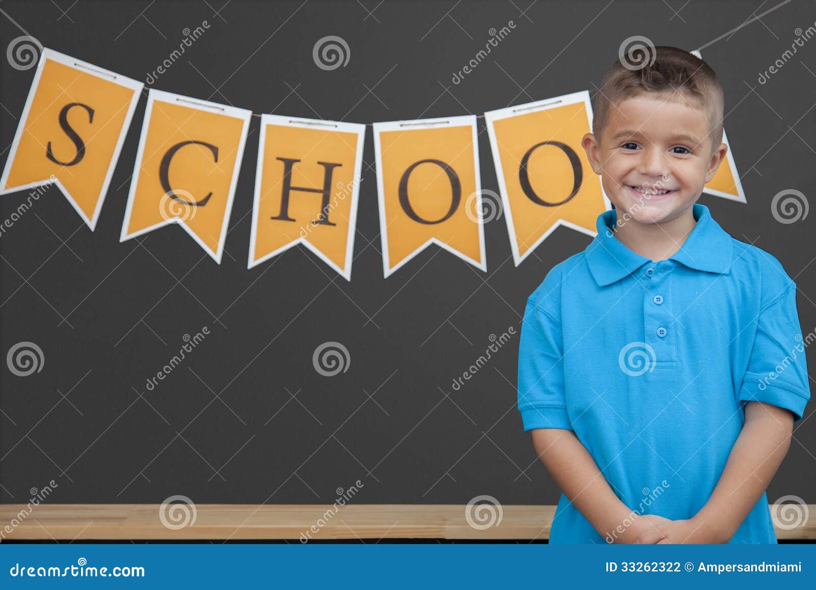 Young Boy in the Classroom stock photo. Image of expressing - 33262322