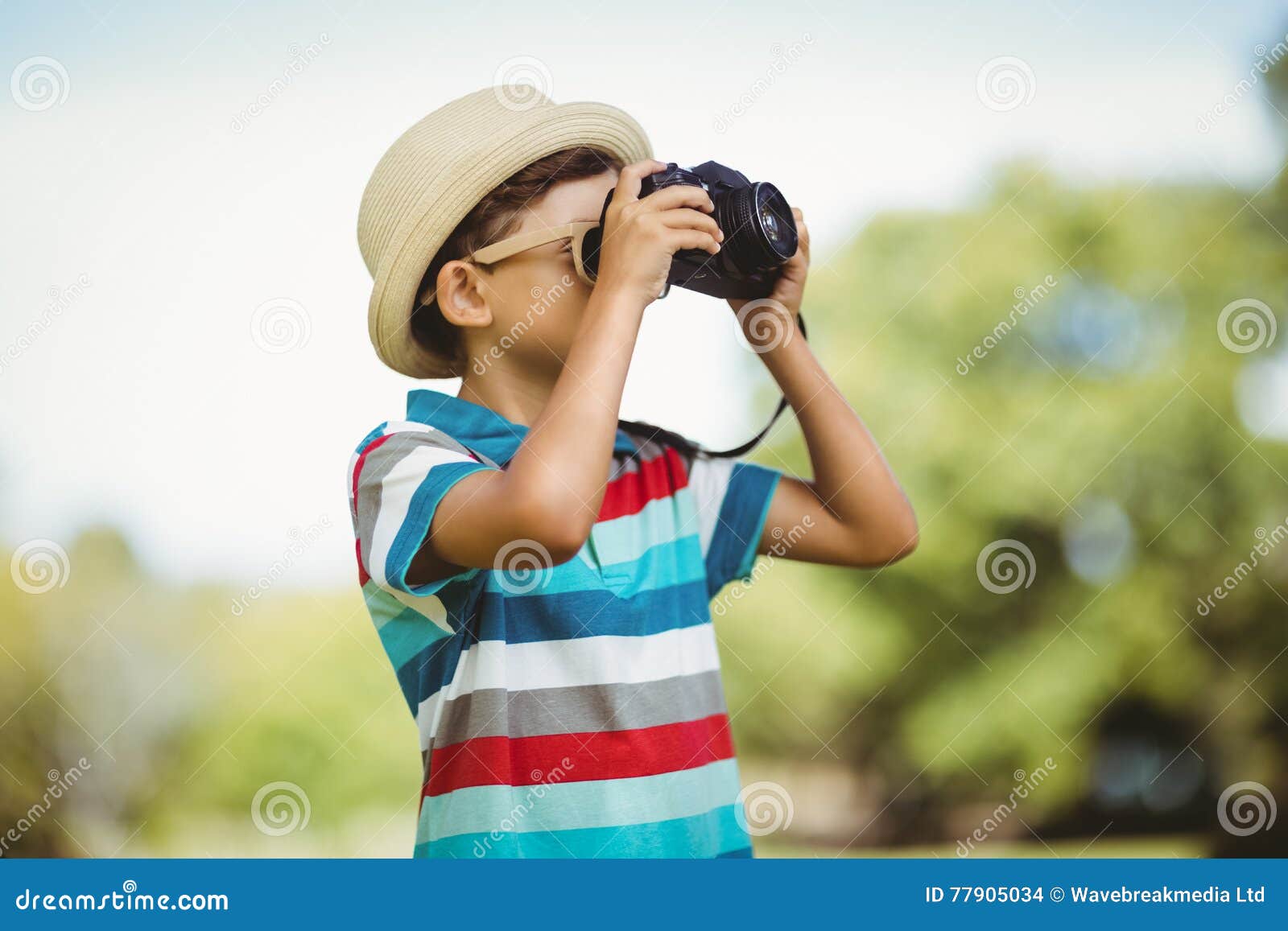 Young Boy Clicking a Photograph from Camera Stock Photo - Image of male ...