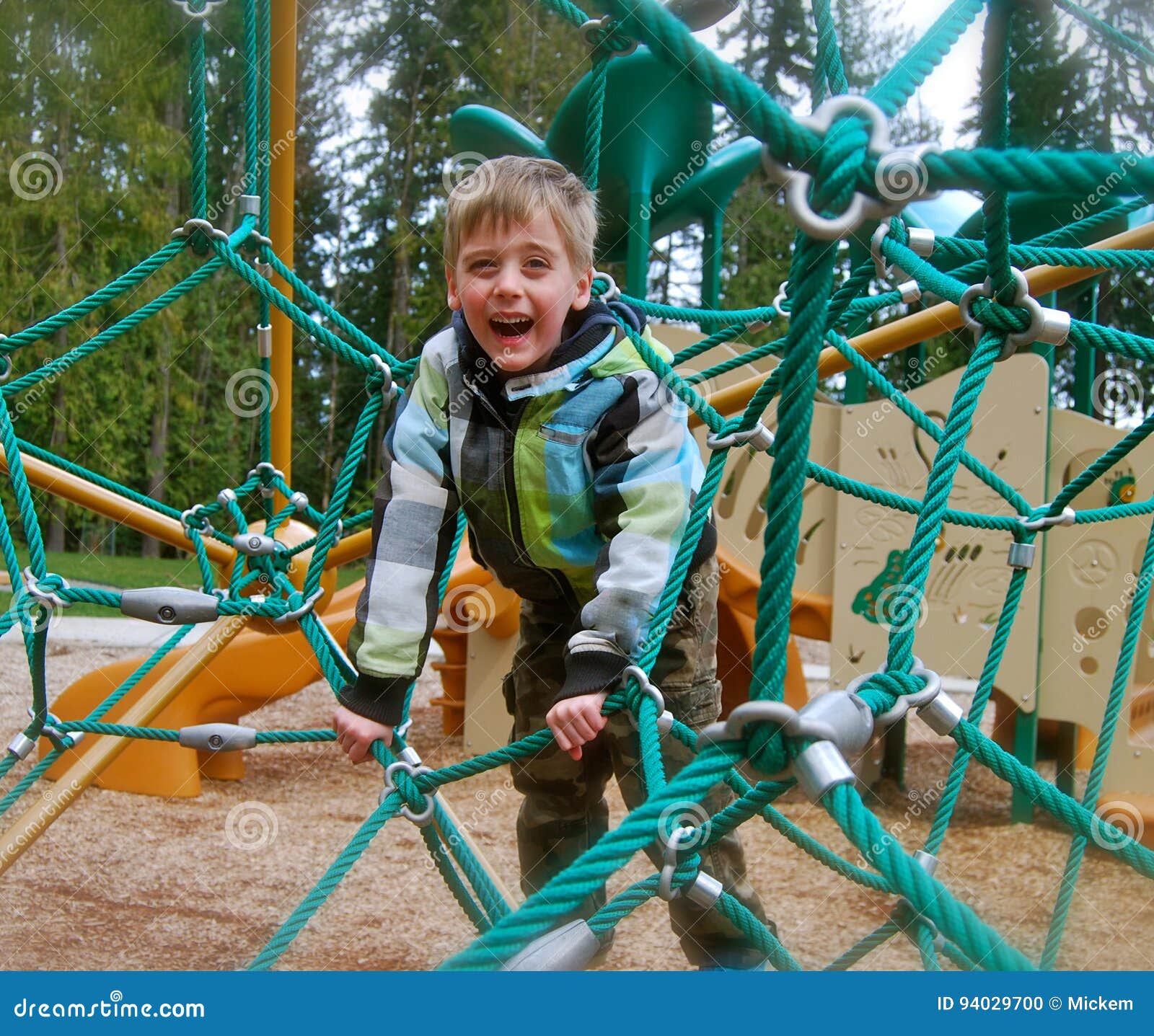 Young Boy Climbing Playground Structure Stock Photo - Image of child ...