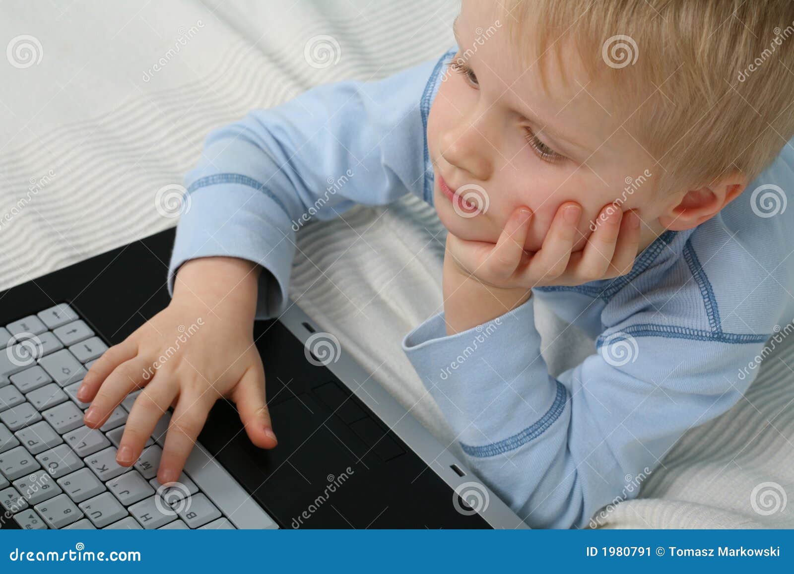 Young Boy and Computer stock image. Image of casual, blond - 1980791